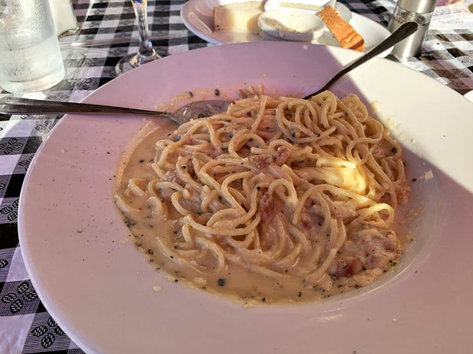 This creamy carbonara isn’t just dinner; it’s a hug in a bowl. The perfectly cooked noodles swimming in velvety sauce would make any nonna proud.