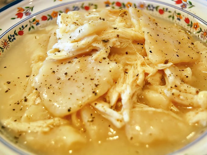 Behold the legendary chicken and dumplings—tender meat swimming alongside pillowy dough islands in a sea of savory broth that grandmothers everywhere would approve of.
