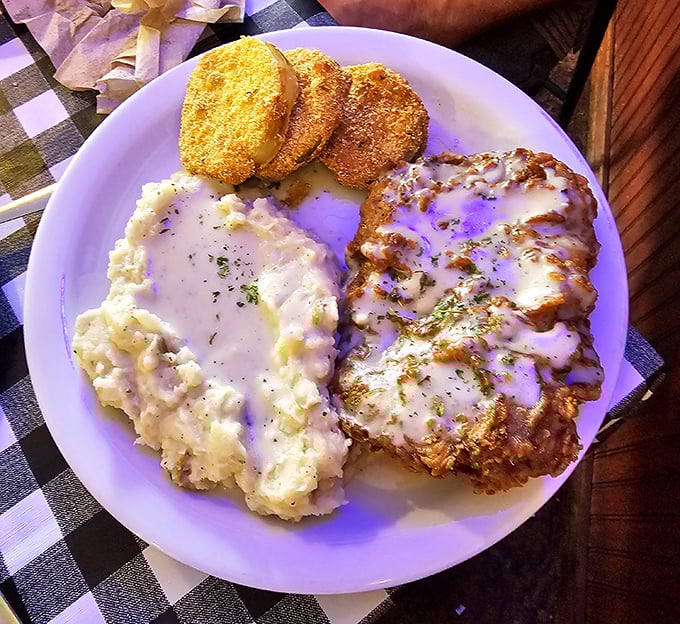 Chicken fried steak that could make a vegetarian weep with temptation. That cream gravy isn't just a topping—it's liquid comfort. 