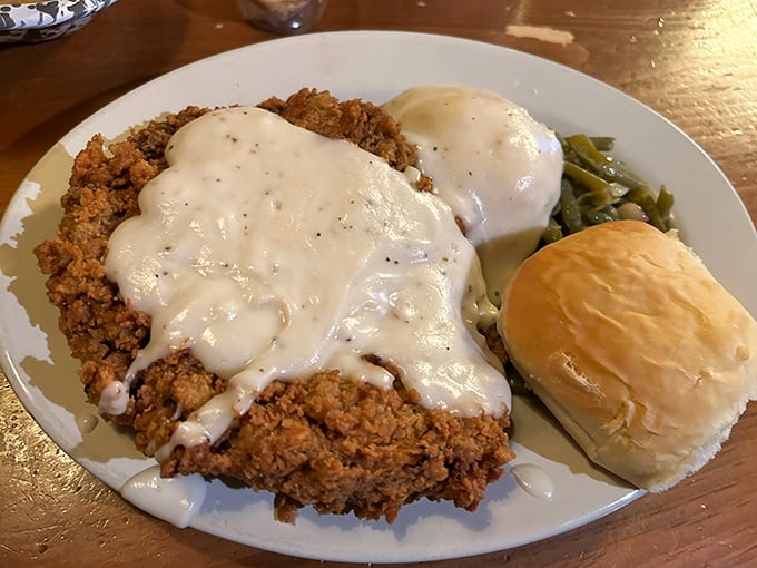This isn't just chicken fried steak—it's edible artwork, a masterpiece of crispy coating and peppery gravy that demands your full attention.