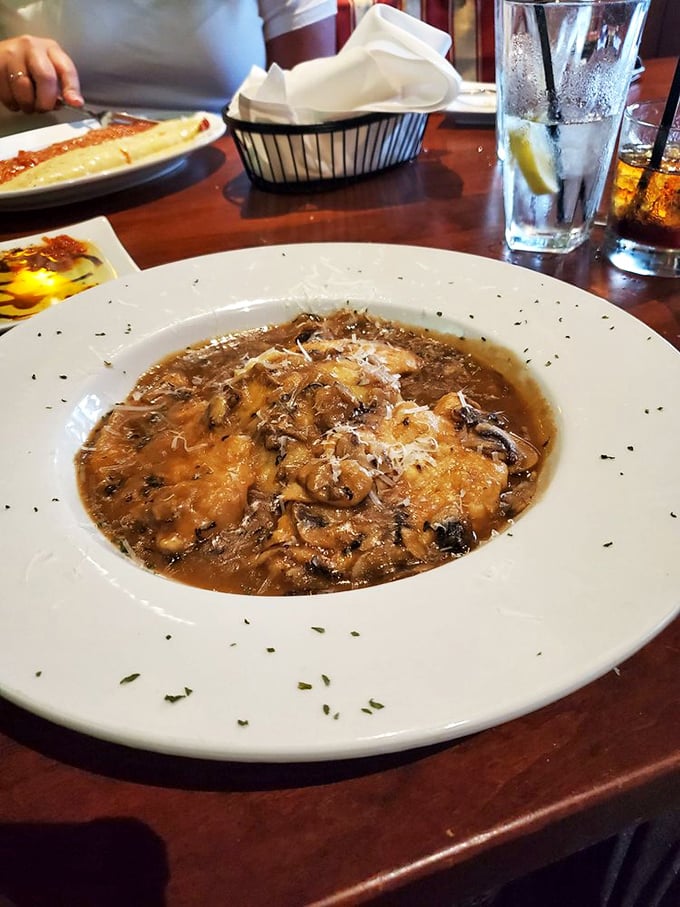 This Chicken Marsala isn't just dinner—it's a mushroom-studded masterpiece swimming in a sauce you'll want to bottle and take home.