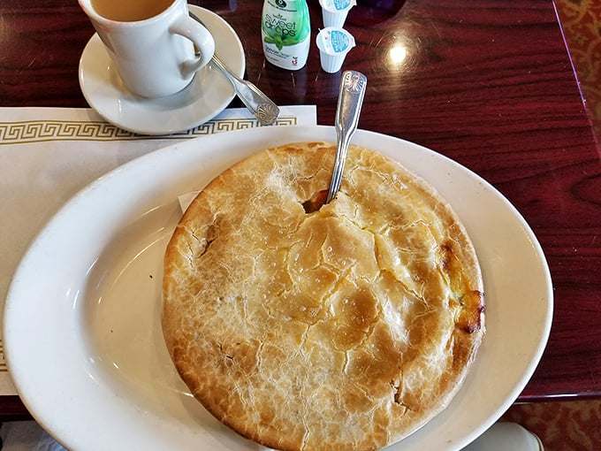 Golden, flaky crust hiding a steamy treasure of chicken and vegetables—this pot pie doesn't need superpowers to save your day.