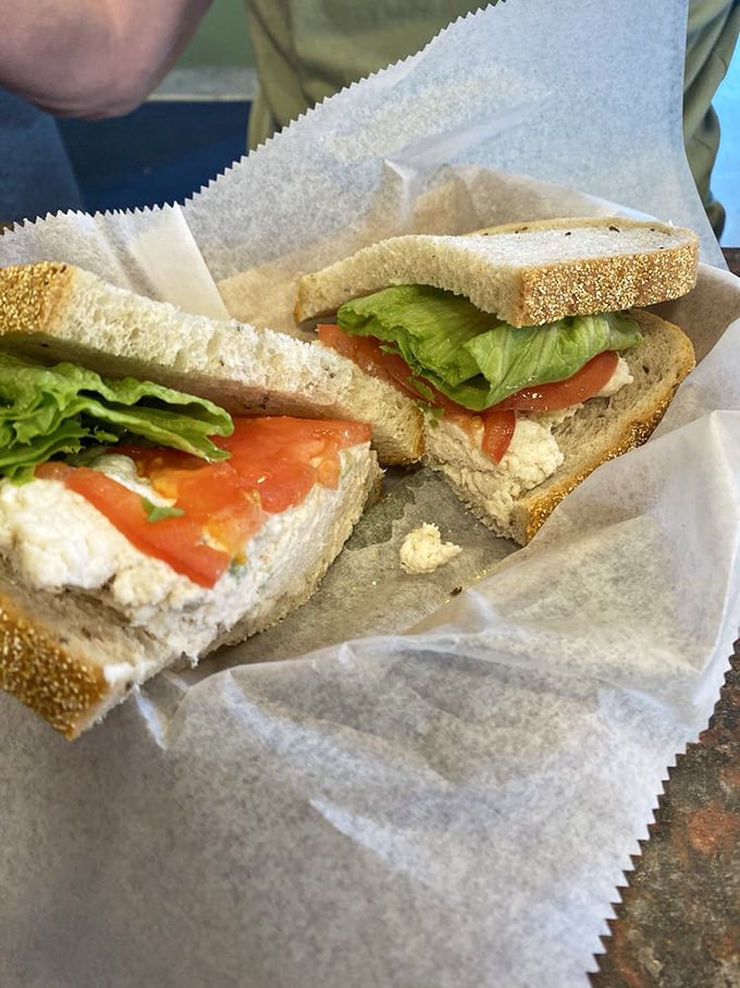 The chicken salad sandwich – deceptively simple yet profoundly satisfying, like finding the perfect pair of comfortable shoes that also look fantastic.
