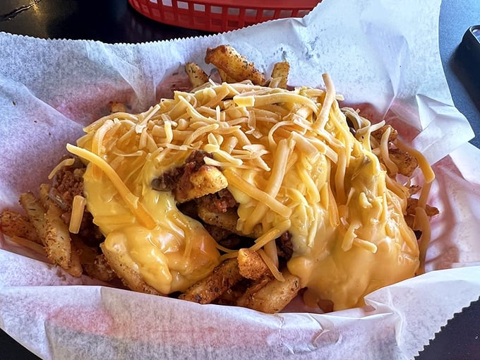 Cheese fries aren't just a side dish here—they're an architectural achievement that would make Frank Lloyd Wright weep with cheesy joy.