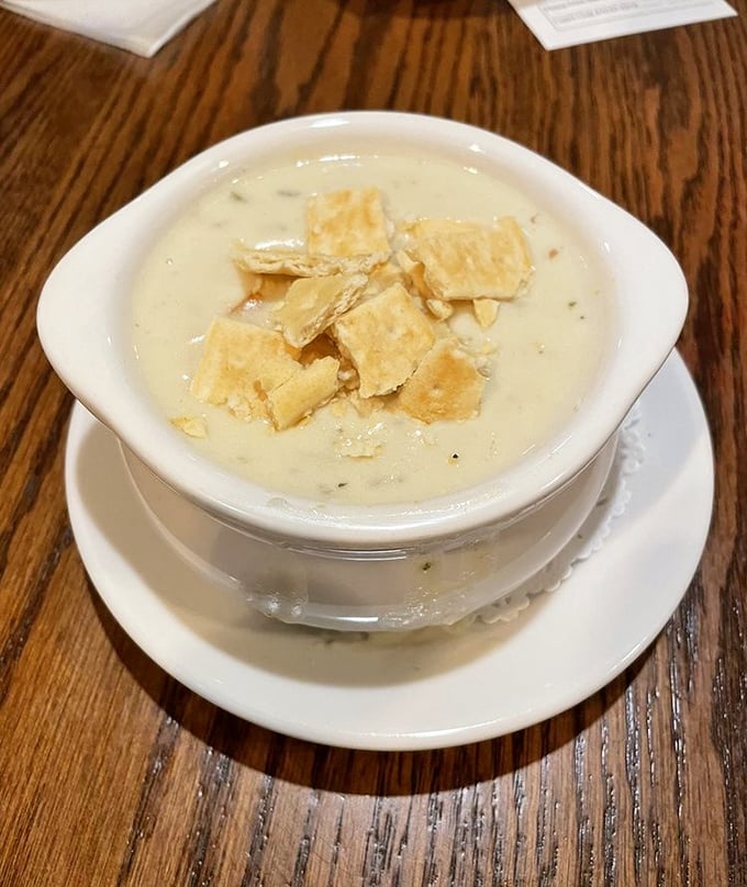 This isn't just chowder—it's a creamy New England vacation in a bowl, complete with oyster crackers for texture.
