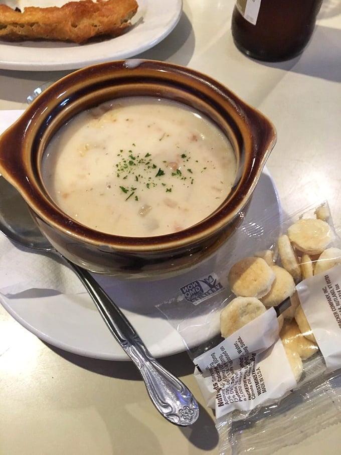 This isn't just clam chowder—it's a warm hug in a bowl, creamy and rich with a sprinkle of herbs that whispers, "Sit down, stay awhile."