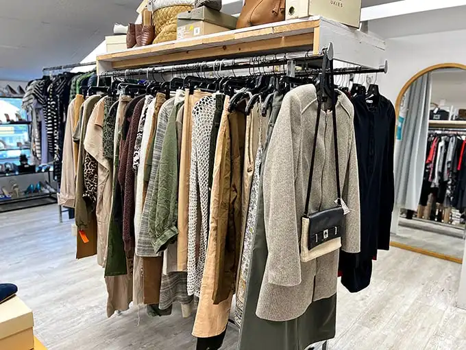 Designer coats and jackets hang in perfect formation, like an army of fashion ready to march into your wardrobe at a fraction of retail prices.
