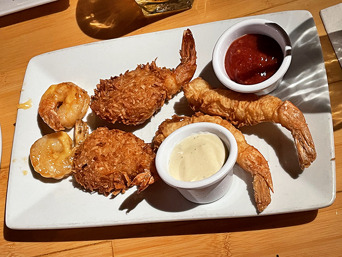 Golden-fried coconut shrimp that crunch like your favorite beach memory. These aren't just appetizers—they're edible postcards from paradise.