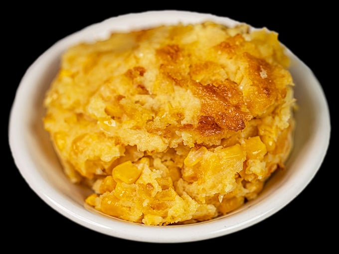 This golden corn casserole isn't just a side dish—it's what comfort would look like if it decided to take physical form and join you for dinner.
