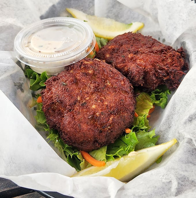 These crab cakes don't play hide-and-seek with the crab. Golden-brown perfection that's all meat, minimal filler, and maximum flavor—the way nature intended.