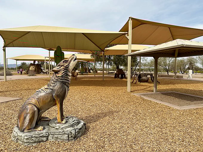 Desert whimsy at its finest – this coyote sculpture howls silently at the sky, welcoming families to a playground where imagination runs wild.