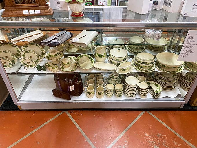 Grandmother's china never looked so tempting—complete place settings waiting for their next family gathering or elegant tea party.