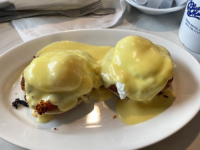 These Eggs Benedict aren't just breakfast, they're a sunrise masterpiece – perfectly poached eggs draped in hollandaise that flows like liquid gold.