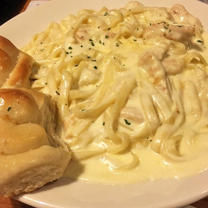 That fettuccine alfredo glistens like edible silk – resistance is futile, and why would you even try?