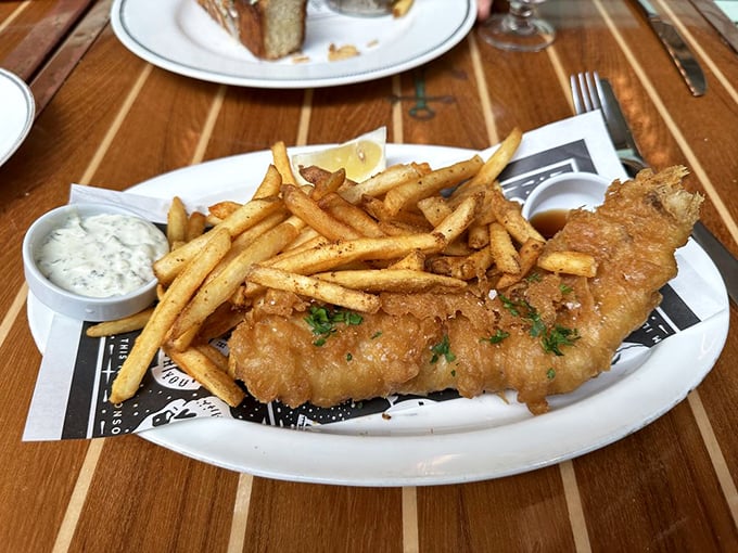Fish and chips that would make a British pub jealous—crispy, golden perfection with fries that deserve their own fan club.
