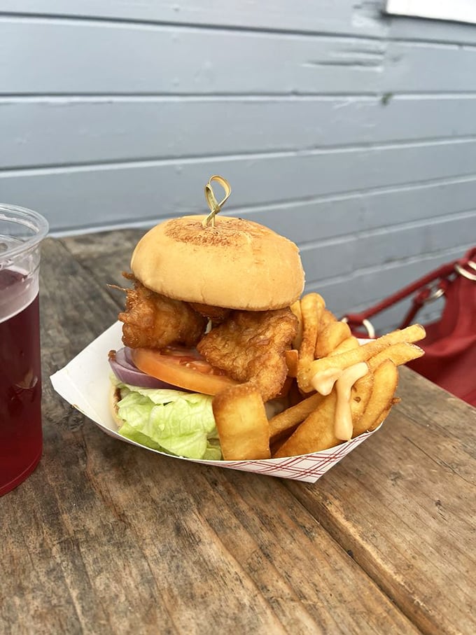 This fish sandwich isn't just lunch; it's maritime architecture—golden-battered cod stacked high with the structural integrity of the Golden Gate.