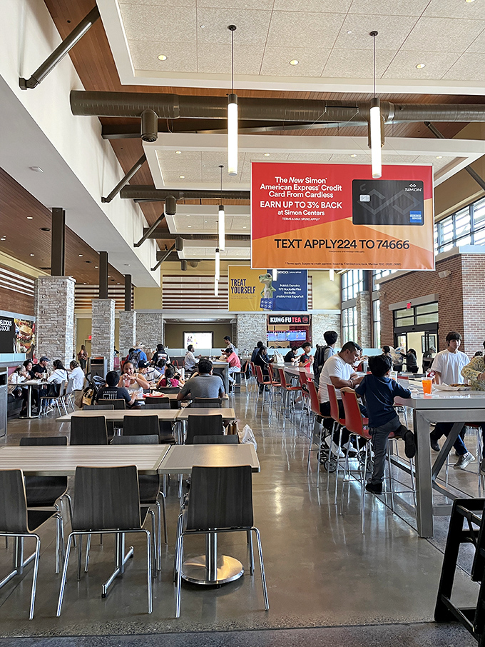 The food court buzzes with the energy of shoppers refueling for round two—a strategic pit stop in the marathon of markdown hunting.