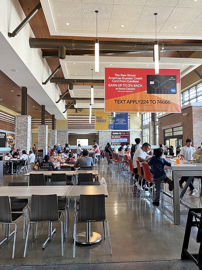 The food court buzzes with the energy of shoppers refueling for round two—a strategic pit stop in the marathon of markdown hunting.