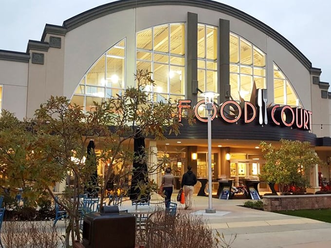 Not all heroes wear capes—some operate food courts where weary shoppers refuel before diving back into the retail marathon. That curved ceiling design? Pure architectural optimism.