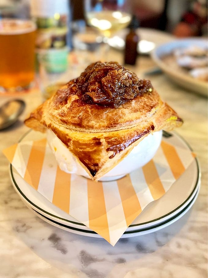 This isn't just French onion soup—it's a masterpiece of melted cheese, caramelized onions, and crusty bread. The kind of dish that makes you want to propose marriage to your server.