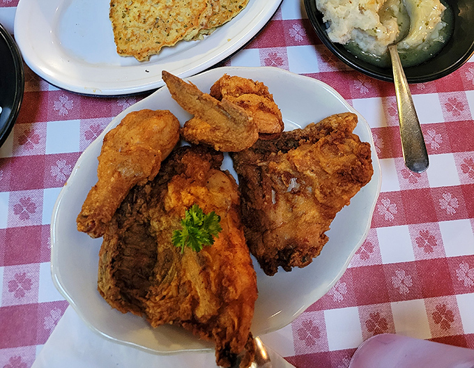 Golden-brown perfection that makes Colonel Sanders look like an amateur. This isn't just fried chicken—it's a masterclass in crunch-to-juiciness ratio.
