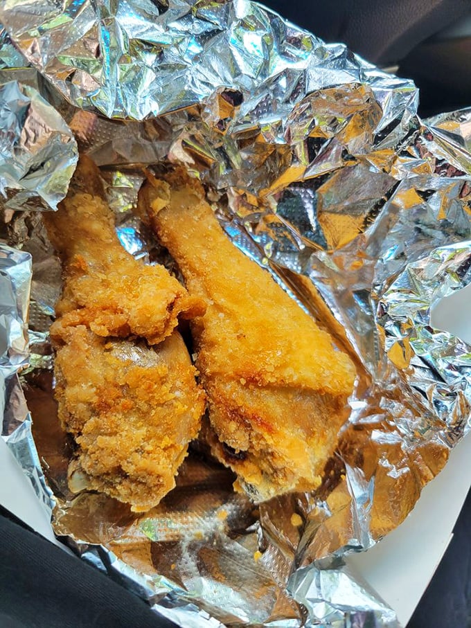 Golden-brown perfection wrapped in foil – this chicken's crackling exterior gives way to juicy, tender meat within.
