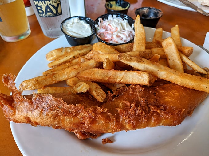 Golden, crispy perfection that makes fish skeptics reconsider their life choices. This walleye doesn't swim anymore, but it soars.