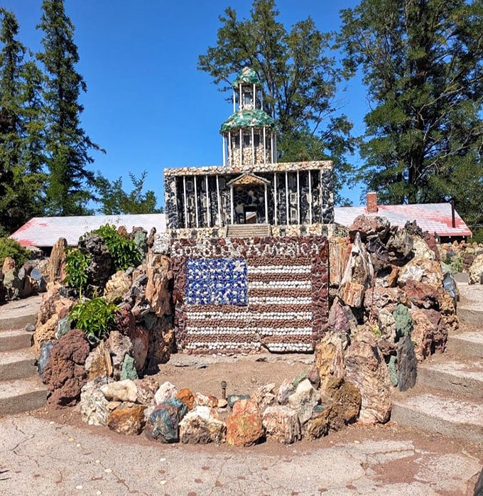 America in stone and spirit—this patriotic display features a meticulously crafted flag and capitol building, proving rock art can indeed be presidential.