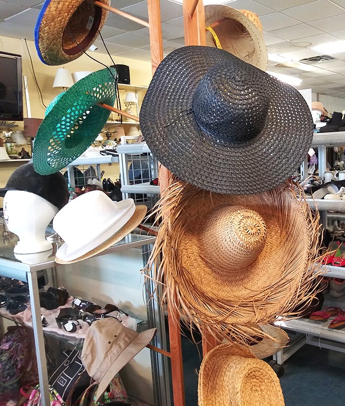 A tower of summer style! From wide-brimmed sun protection to floppy beach chic, the hat collection rivals what you'd find at a fancy department store. 
