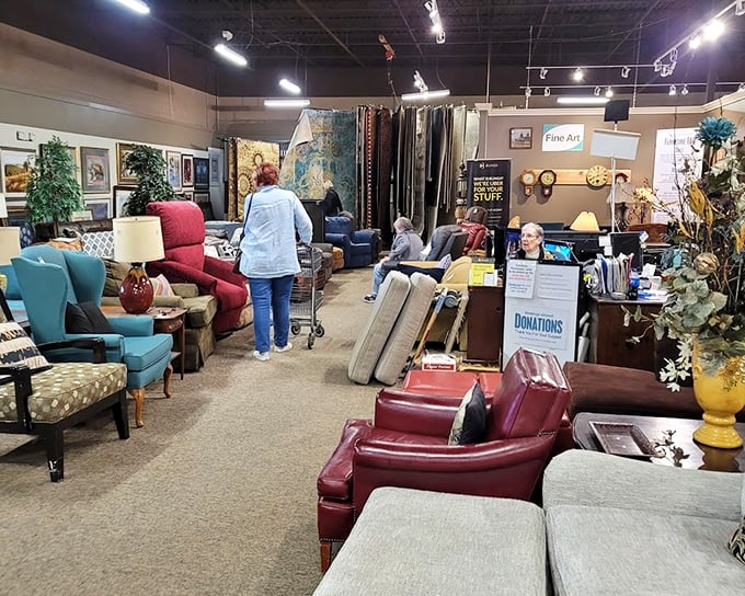 Furniture arranged with the care of a museum curator. That burgundy leather chair isn't just pre-loved—it's been on a journey and has stories to tell.