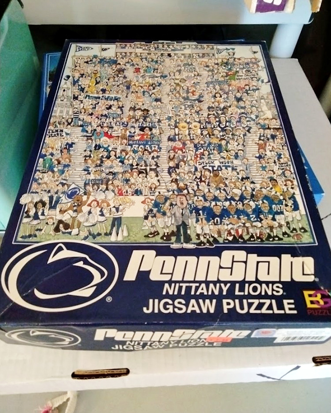 Penn State pride meets puzzle passion. Nothing says "Pennsylvania living room" quite like a completed Nittany Lions jigsaw on display.