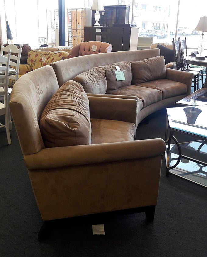 This curved sectional sofa isn't just pre-loved—it's waiting for its second act in someone's living room drama. Quality at a fraction of retail.