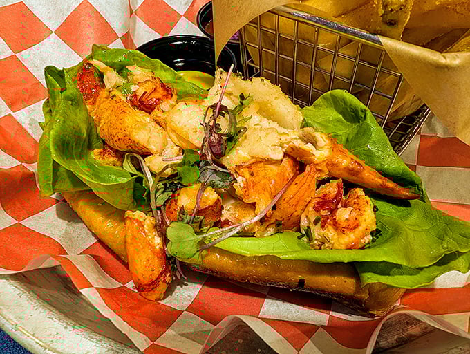 This isn't just a lobster roll—it's edible poetry. Succulent chunks of lobster nestled in a perfectly toasted bun with fresh greens playing supporting roles.