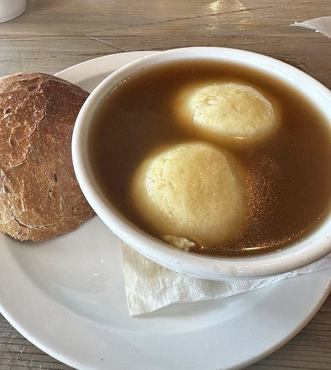 Matzo ball soup that would make your grandmother nod in approval. Those fluffy dumplings float like clouds in golden broth—comfort in a bowl.