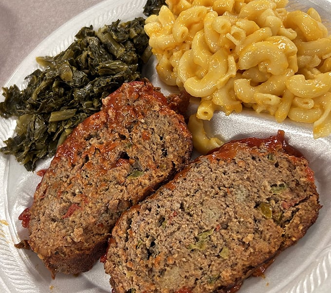 Meatloaf that would make your grandmother jealous, flanked by collard greens and mac & cheese that aren't just sides—they're co-stars.