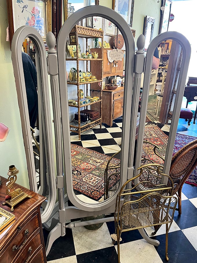 This elegant three-panel mirror doesn't just reflect your image – it reflects an era when getting dressed was an event worth three perspectives.