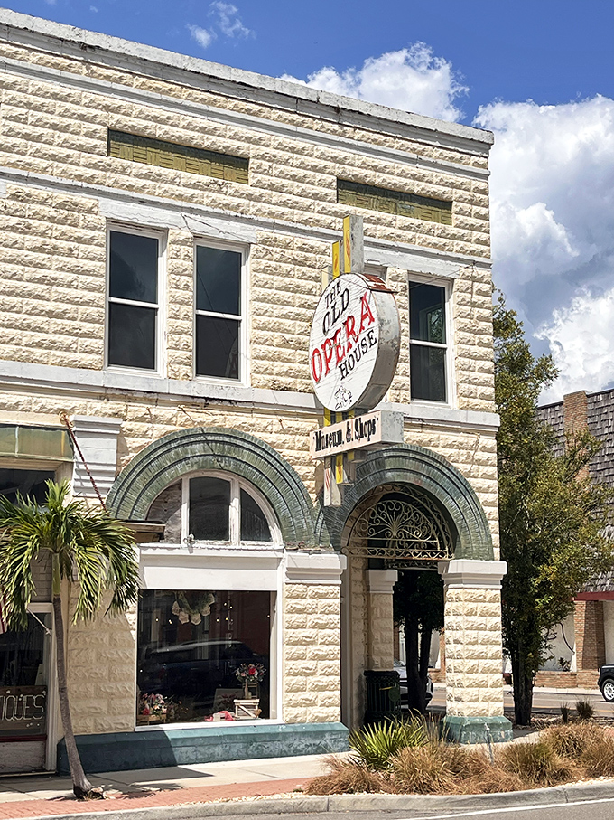 The Old Opera House isn't just selling antiques—it's practically an antique itself, its limestone facade a testament to when small towns built with big-city ambitions.