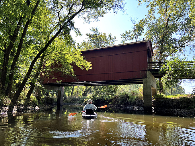 Who needs Venice when you can paddle beneath a piece of American history? This kayaker has the right idea.