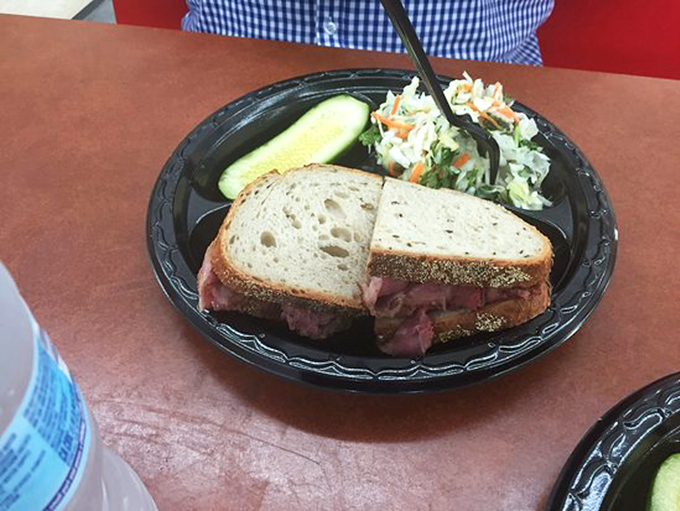 This pastrami sandwich could make a vegetarian question their life choices – gloriously overstuffed perfection.