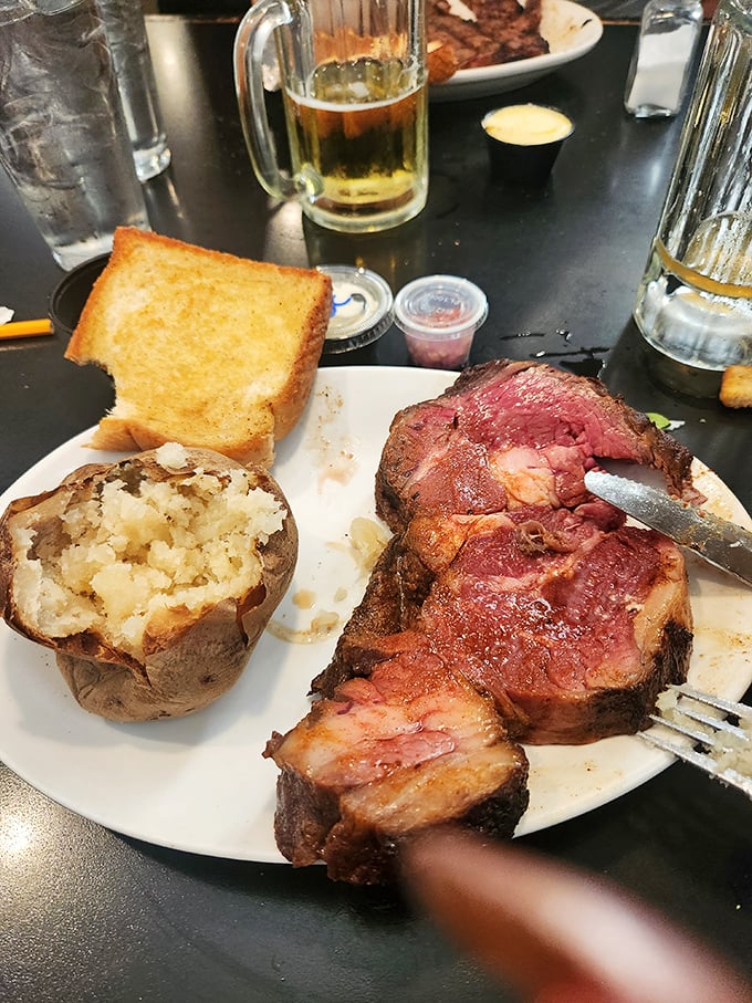Behold the star of the show: prime rib so perfectly cooked it makes you wonder if you've ever truly experienced beef before today.