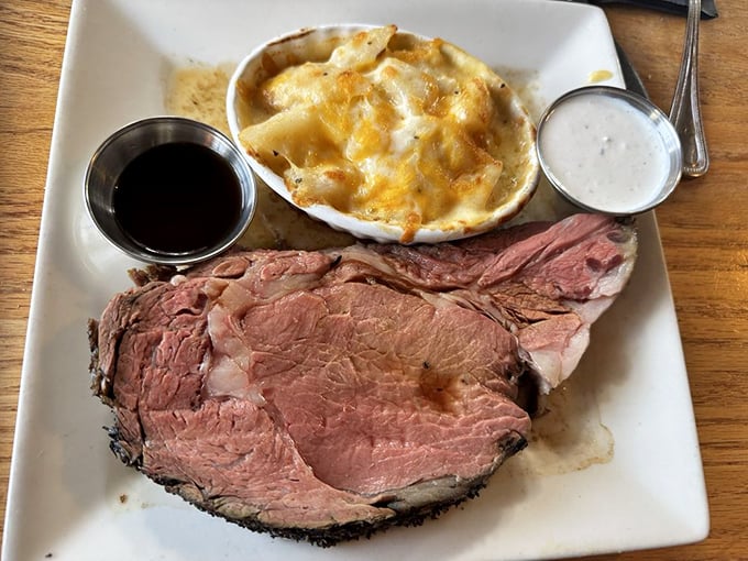 This isn't just prime rib; it's a masterclass in meat—perfectly pink, impossibly tender, with sides that know their supporting role.