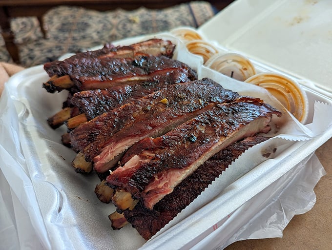 These ribs don't just fall off the bone—they practically leap into your mouth with smoky, tender enthusiasm.