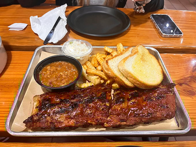 Behold, the barbecue equivalent of Michelangelo's David. These ribs don't just fall off the bone—they practically leap into your mouth.