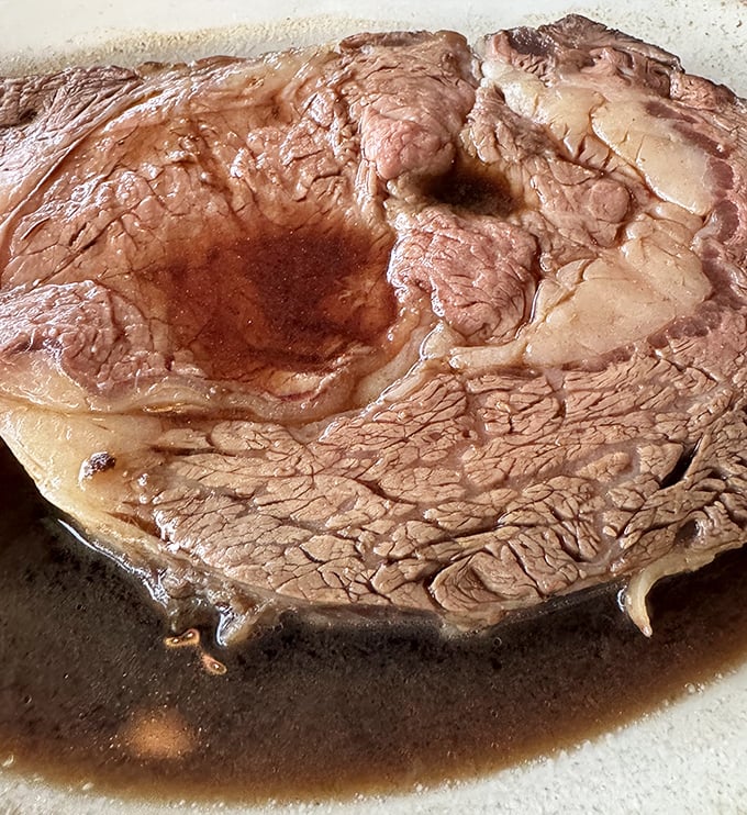 This isn't just roast beef—it's a masterclass in meat. Tender, juicy, and swimming in its own savory juices like it's enjoying a Florida vacation.