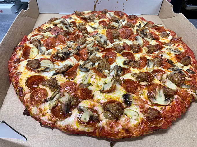 This meat lover's dream pizza doesn't just talk the talk—it walks the walk with a perfect ratio of pepperoni, sausage, and melty cheese that means business.