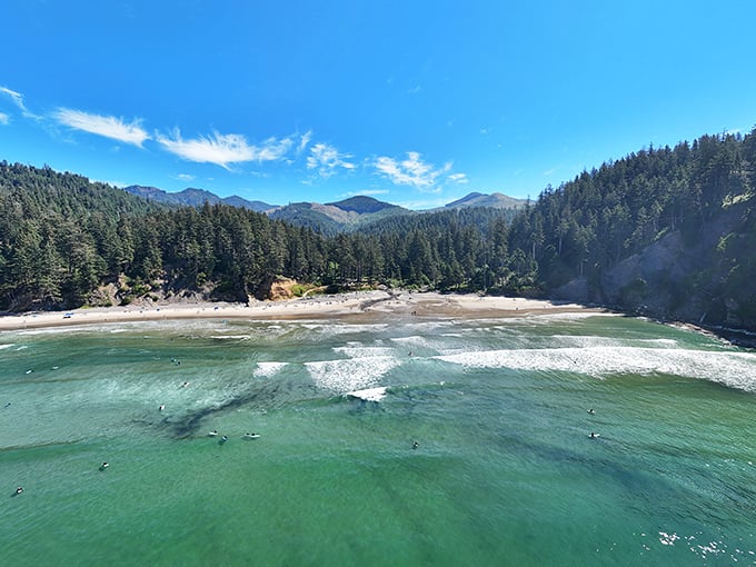 Looking down from the cliffs, the beach spreads out like a postcard someone forgot to mail.