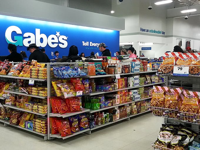 The snack section near checkout – because hunting for deals works up an appetite that only discounted gourmet treats can satisfy.