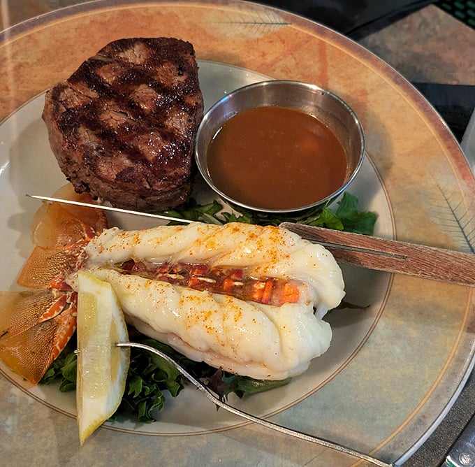 The ultimate surf and turf: perfectly grilled steak alongside succulent lobster tail. It's the culinary equivalent of having your cake and eating it too.