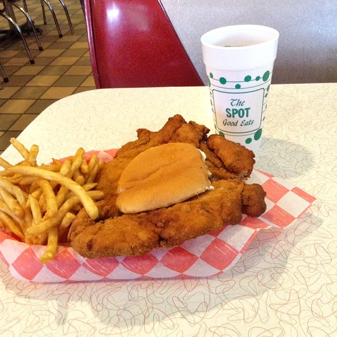 The legendary tenderloin sandwich extends well beyond its bun's jurisdiction, creating that perfect Midwestern dilemma: eat the edges first or dive straight into sandwich anarchy?