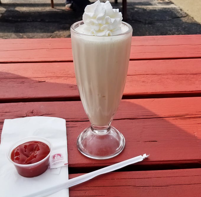 This isn't just a milkshake; it's a frothy time machine that transports you back to when "going viral" meant catching a cold.